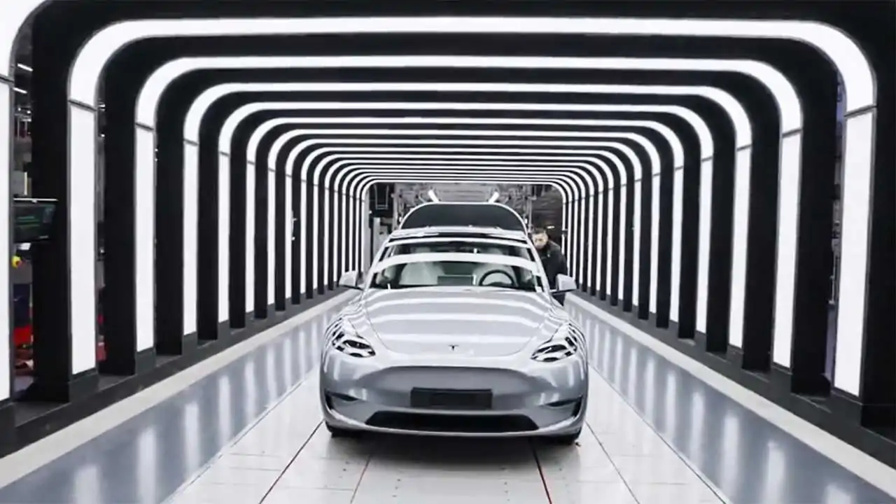 Tesla Showcases "Godzilla" Robot, Advanced Paint System in Factory Tour ...